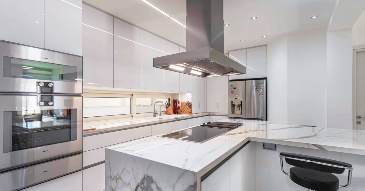 Spacious Calacatta Imperiale marble-effect kitchen offering practical ...